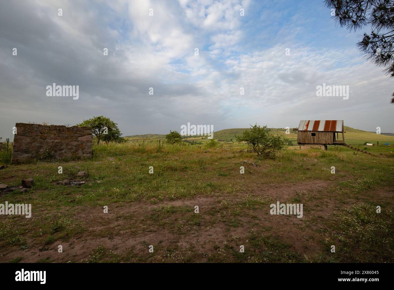 Very old wind mill from 19th century and a disused well in the ...