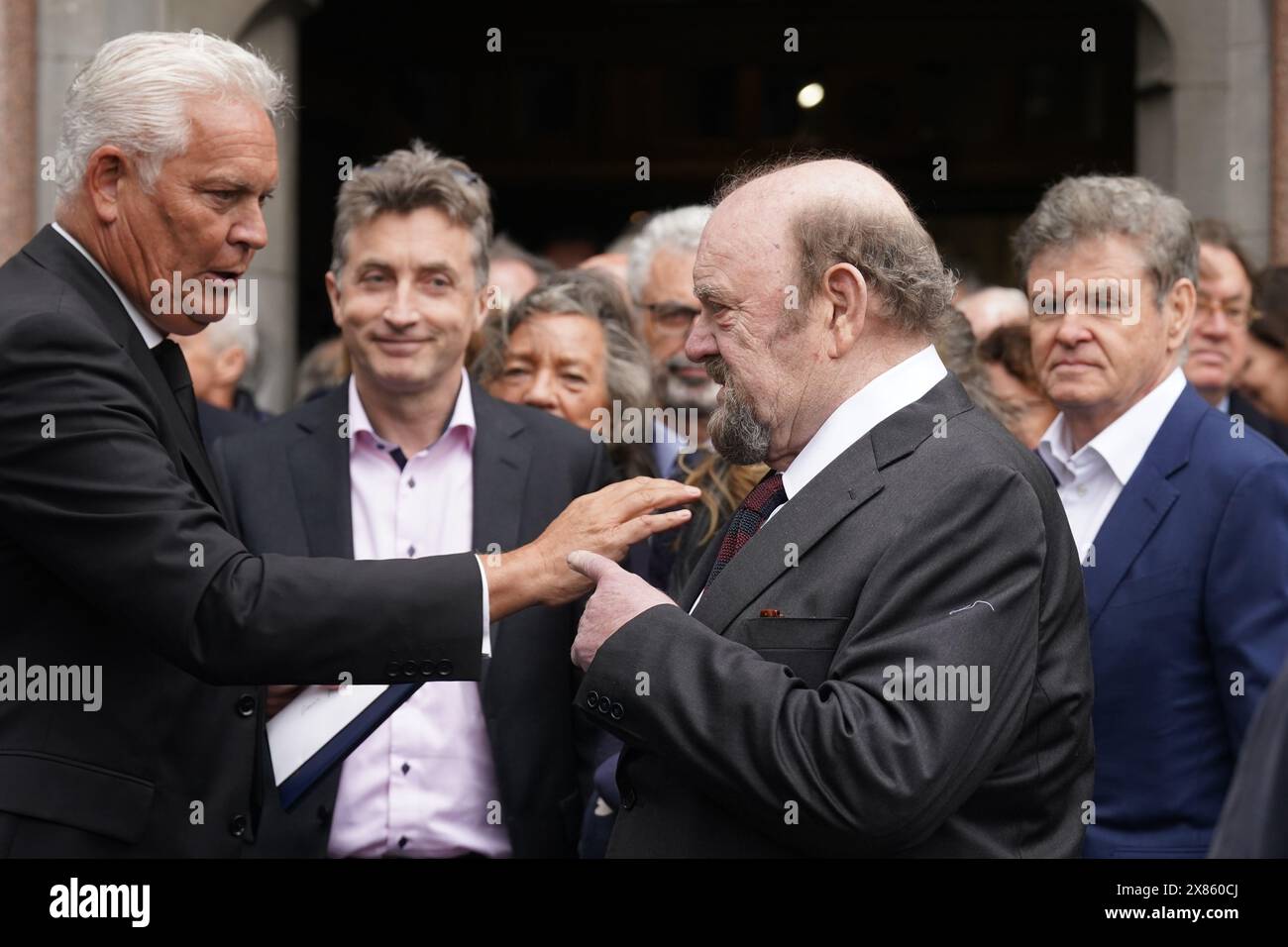 Tony O'Reilly (left) talking to Paul McGuinness following the funeral ...