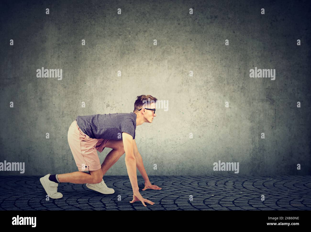 determined man a student ready in a start position Stock Photo - Alamy