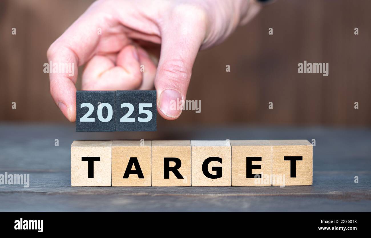 Wooden cubes form the expression '2025 target' Stock Photo - Alamy