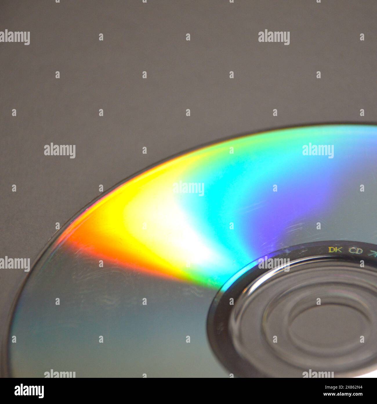 Rainbow Light on the back of a CD Stock Photo - Alamy