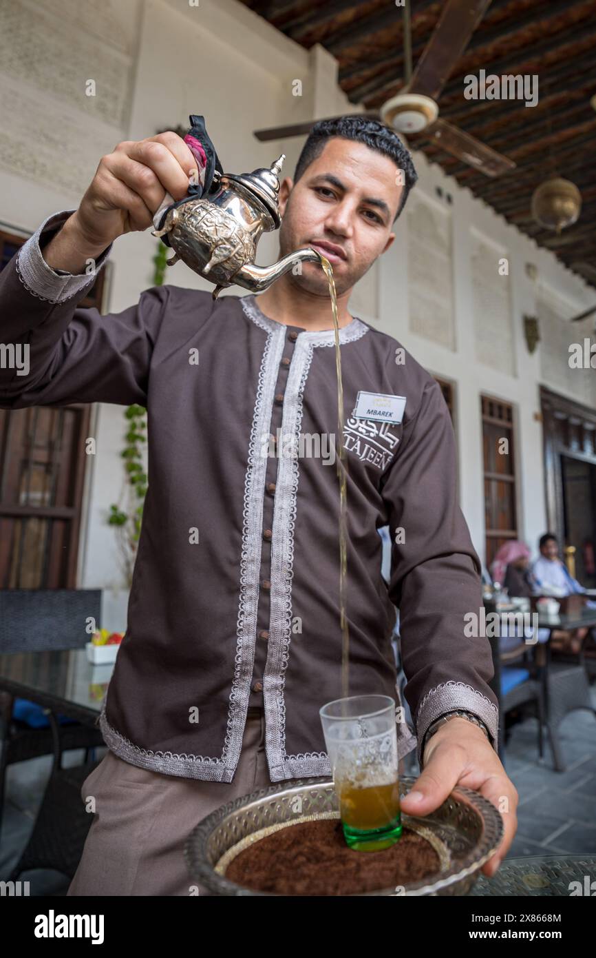 Qatar, Doha, Serving tea in a Moroccan restaurant Stock Photo - Alamy