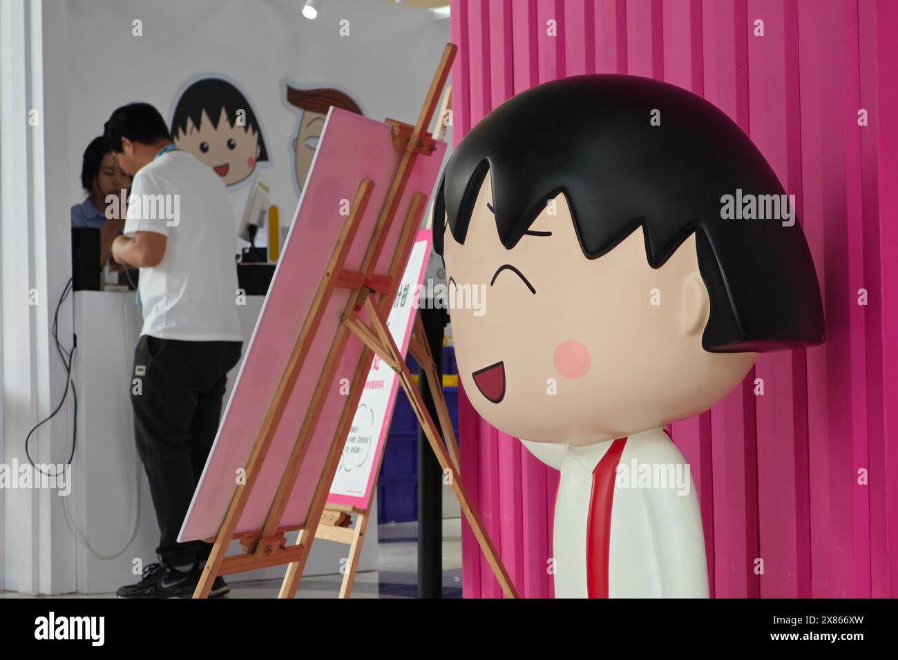SHANGHAI, CHINA - MAY 23, 2024 - Customers spend money at the Chibi Maruko-chan pop-up store in ...