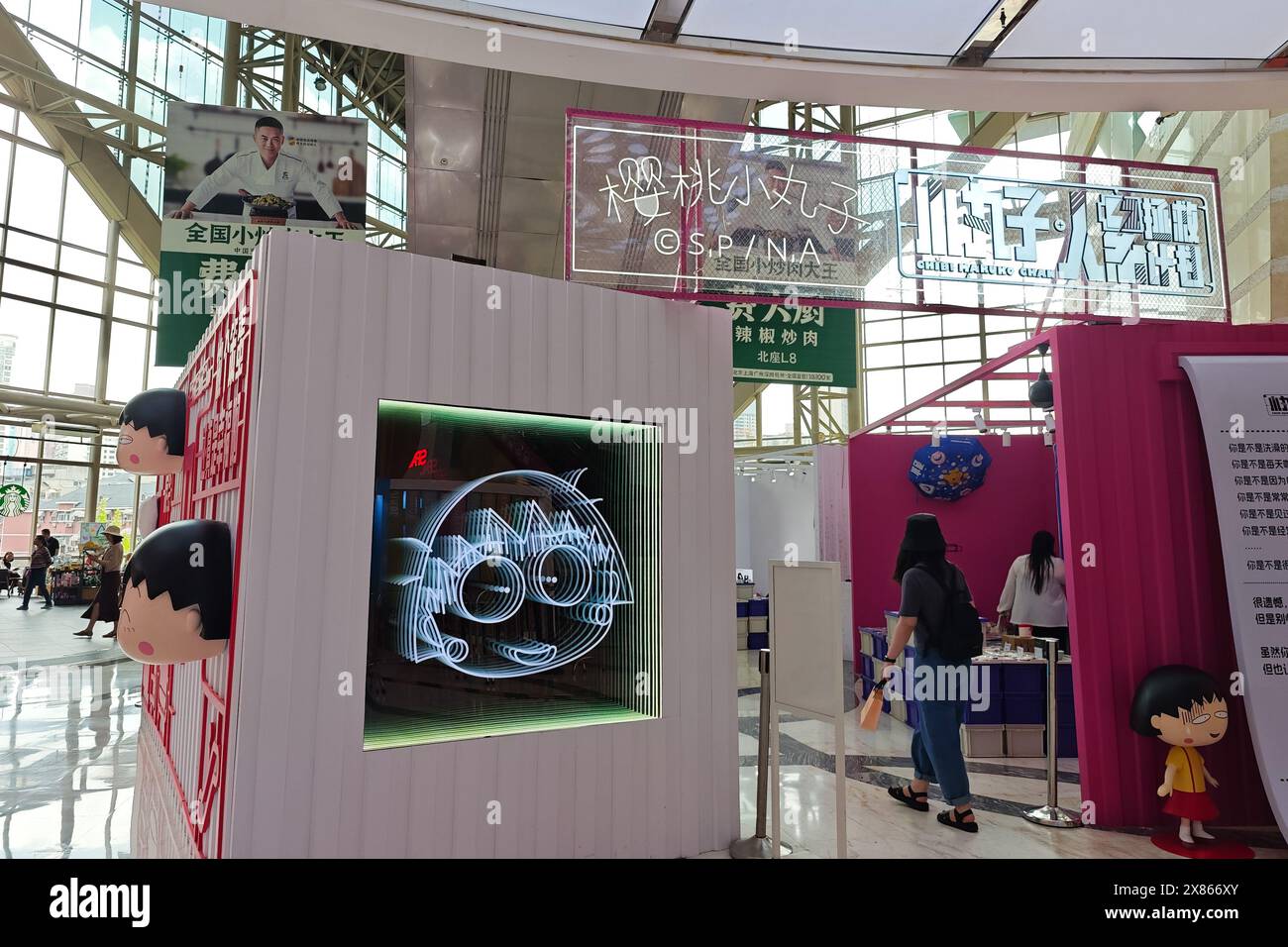 SHANGHAI, CHINA - MAY 23, 2024 - Customers spend money at the Chibi Maruko-chan pop-up store in ...
