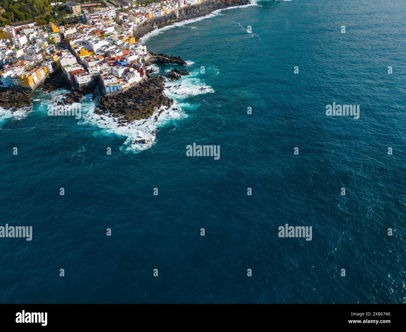 blue water ocean shore, small cozy village Punta Brava, Tenerife ...