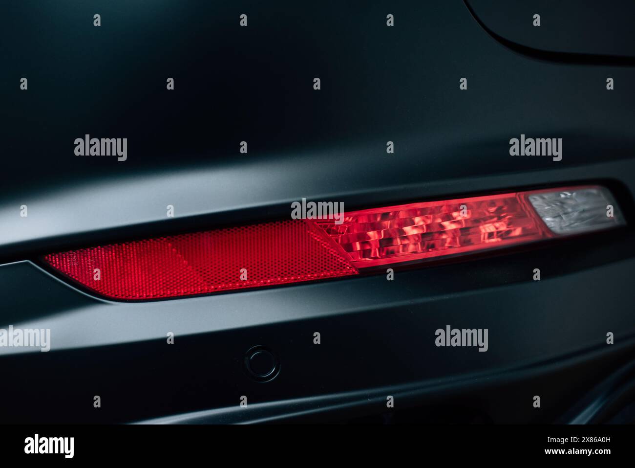 Modern rear light on new matte black automobile. High quality photo ...