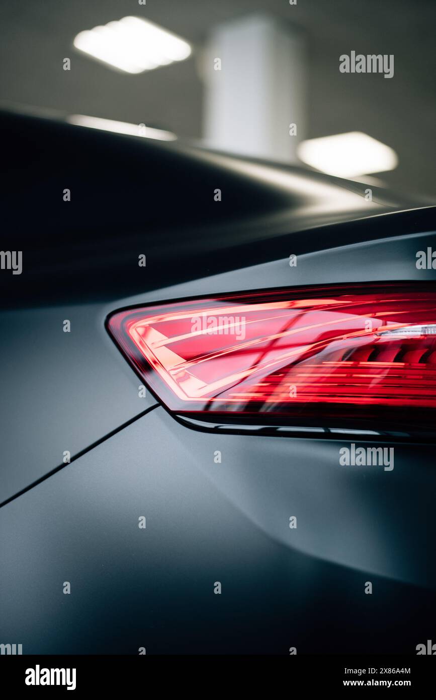 Modern rear light on new matte black automobile. High quality photo ...