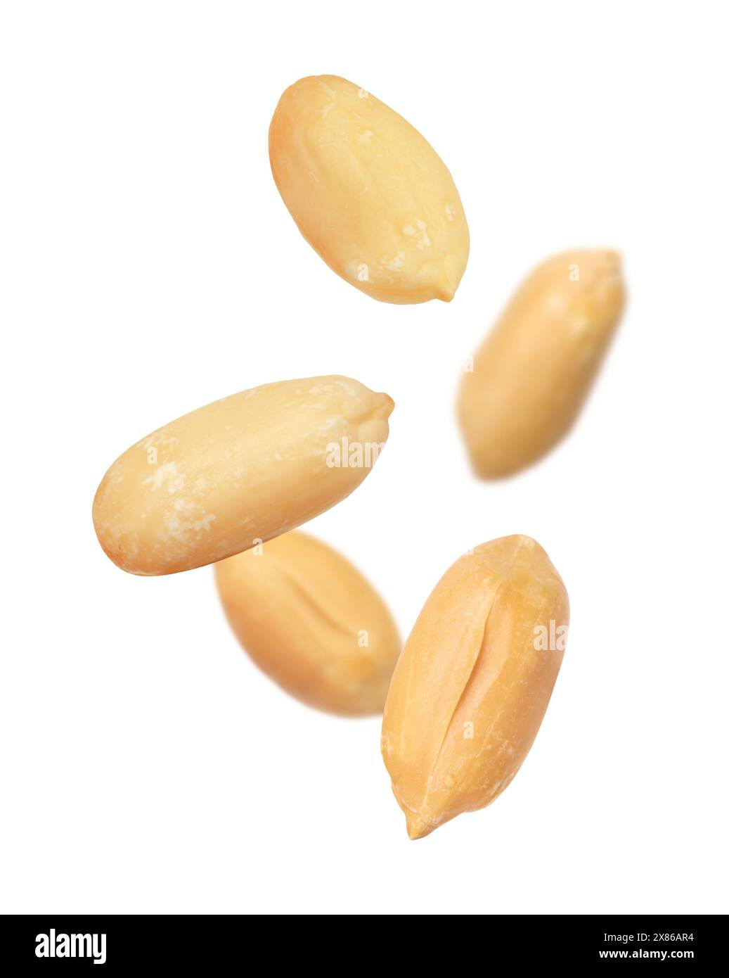 Many peanuts in air on white background Stock Photo - Alamy