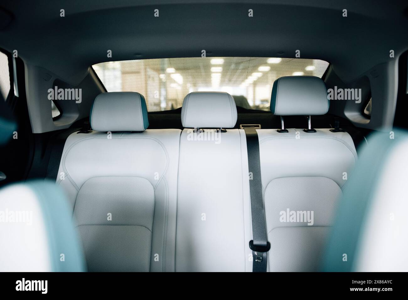 Back passenger seats with armrest electric car. Rear passenger seats ...