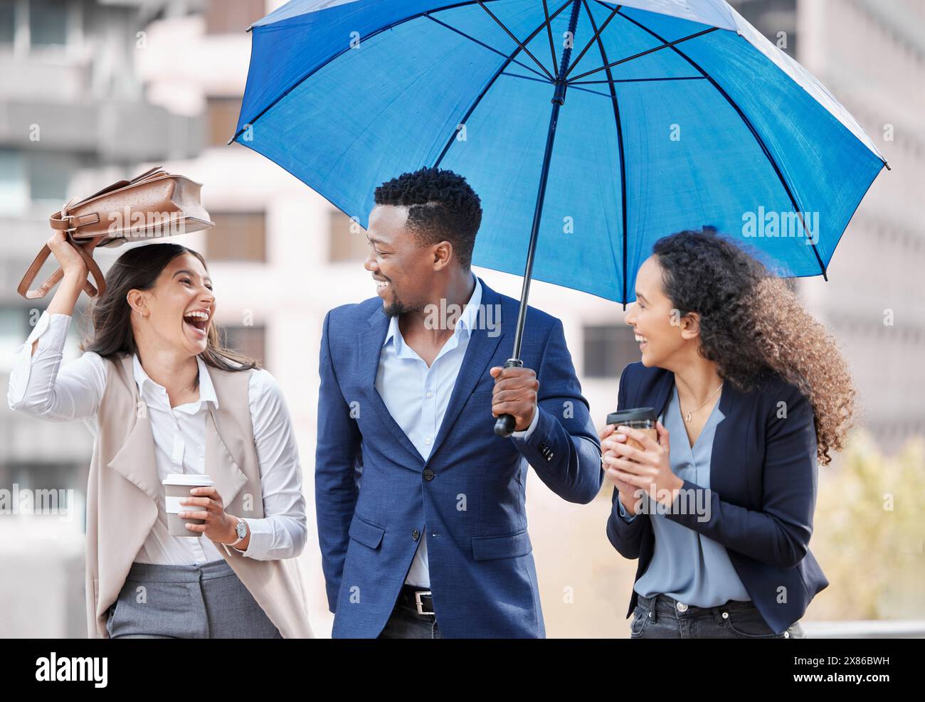 Insurance umbrella teamwork rain hi-res stock photography and images ...