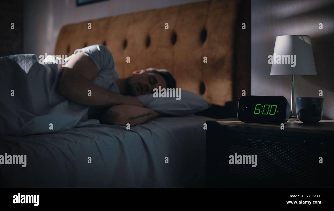 Man Wakes Up and Turns off Alarm Clock. Early Rising Productive Man ...