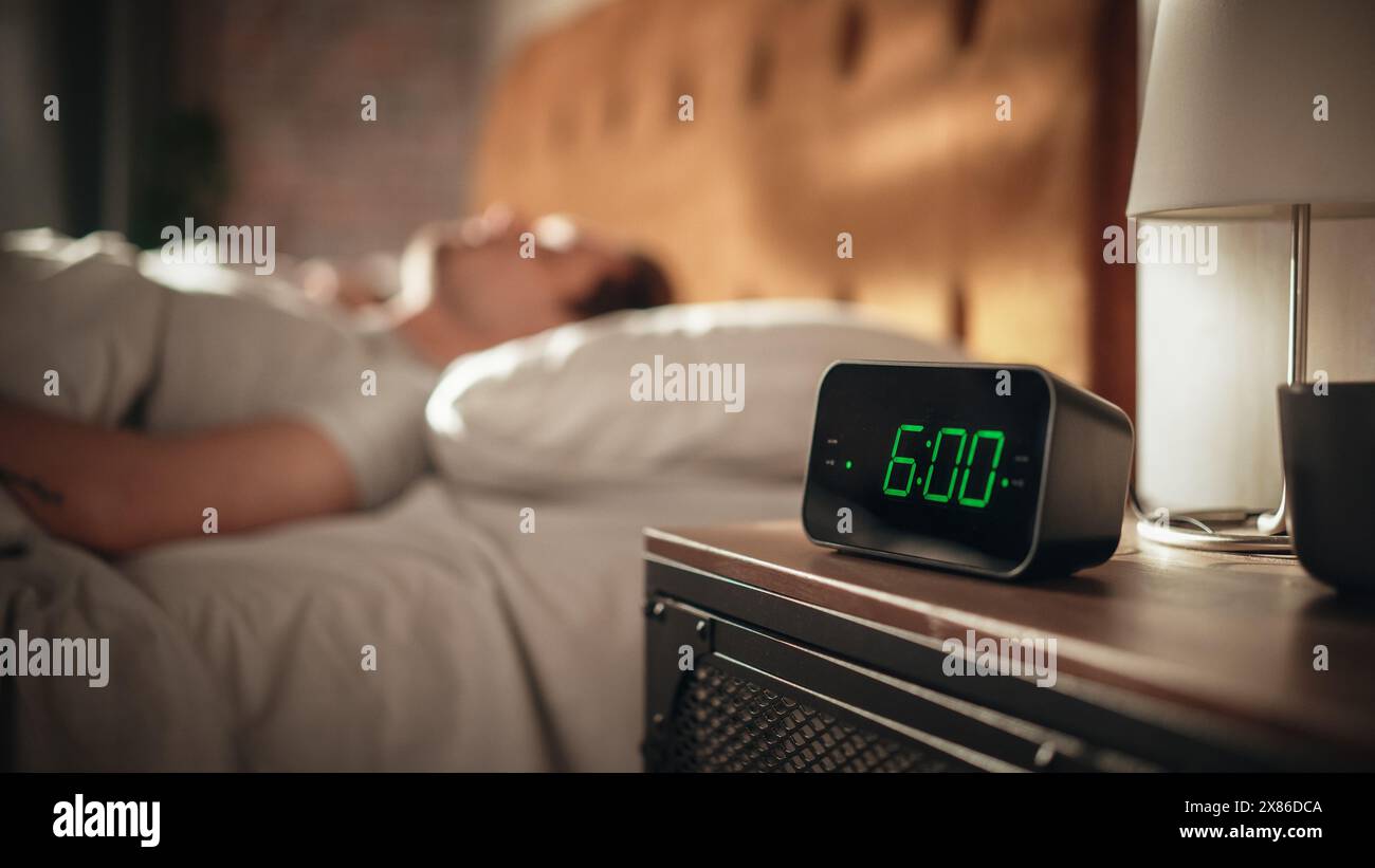 Man Wakes Up and Turns off Alarm Clock. Early Rising Productive Man ...
