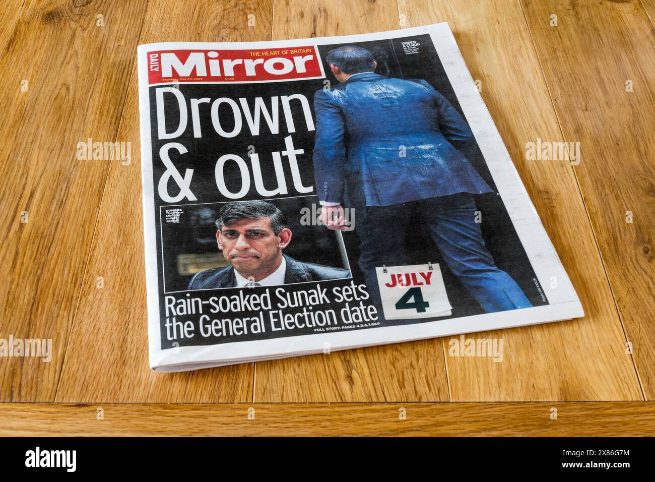 23 May 2024. Daily Mirror headline reads Drown & out, as Rishi Sunak stands in the rain to ...