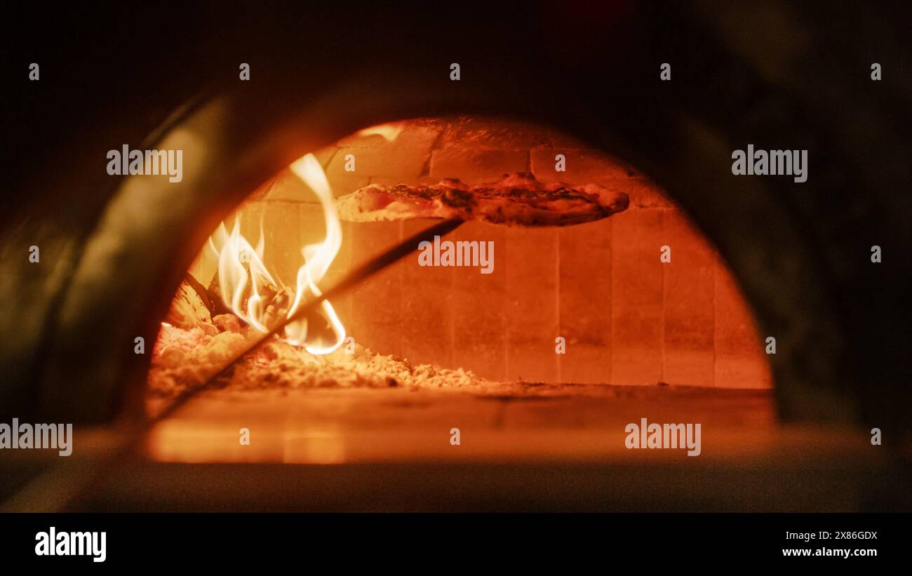 In Restaurant Pizza Peel Preparing Pizza into Wood Fire Stone Oven ...