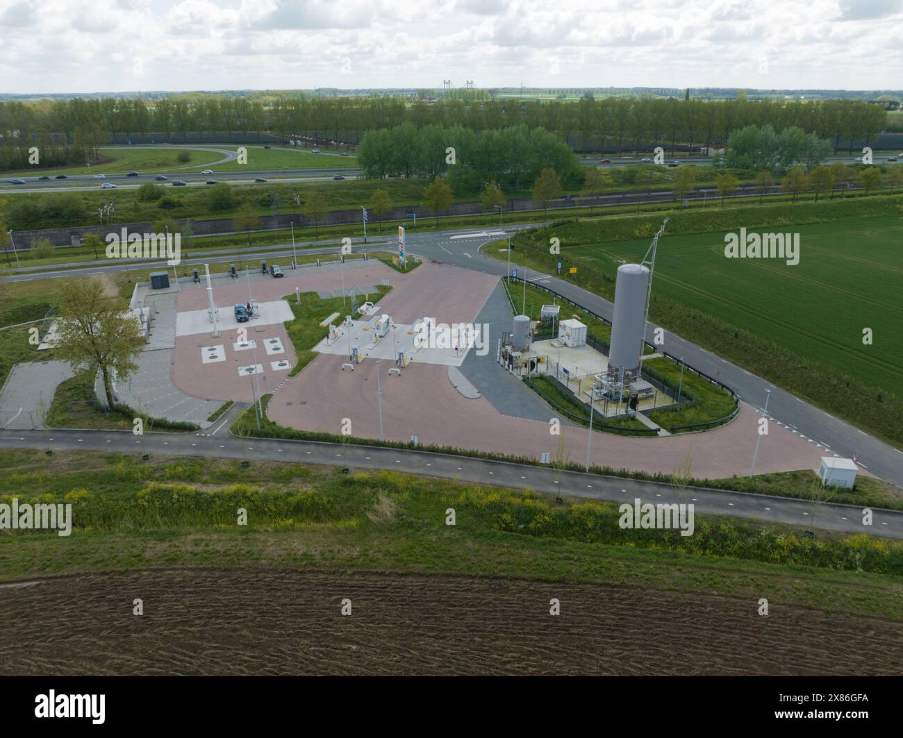 Echteld, Noord Brabant, The Netherlands, March 29th, 2024: Unmanned LNG and truck diesel Shell ...