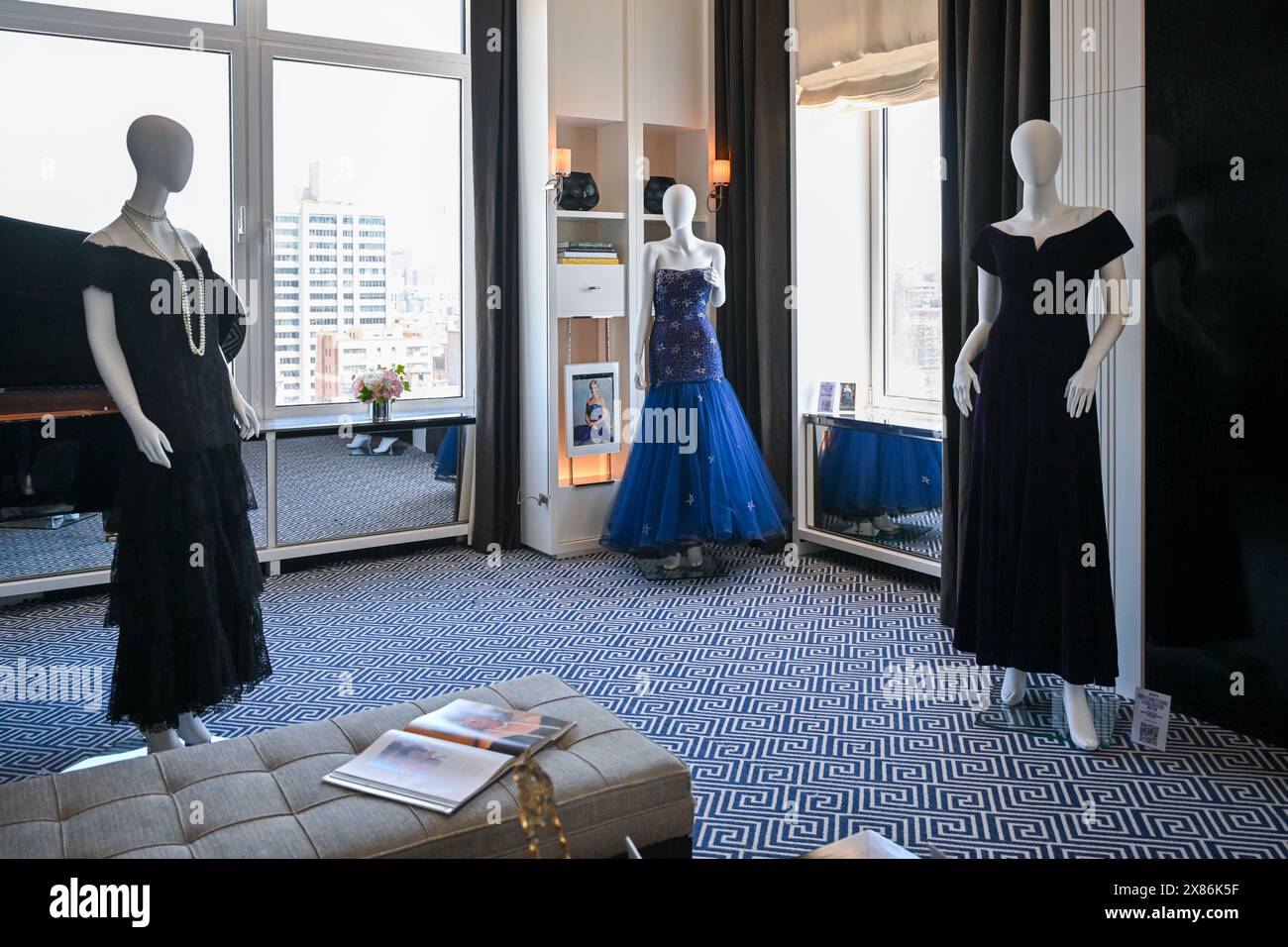 Dresses and personal items owned by Princess Diana on display during a ...