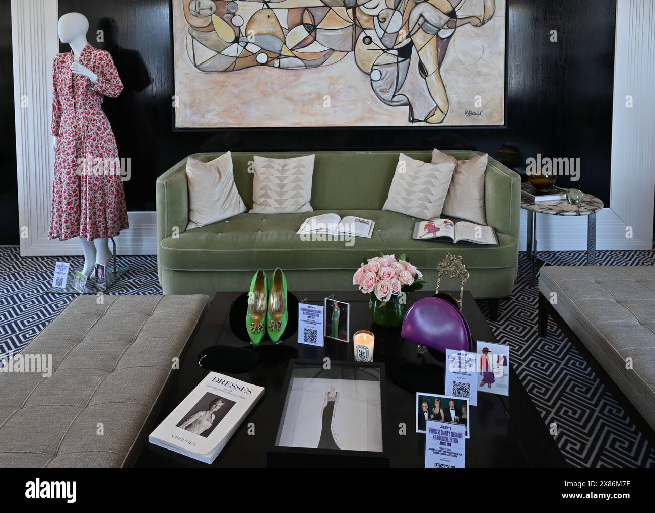 Dresses and personal items owned by Princess Diana on display during a ...