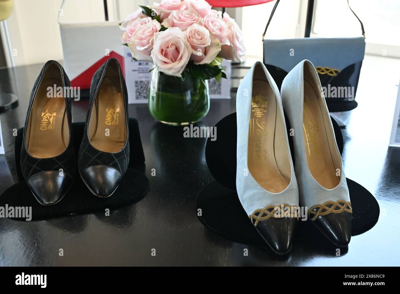 Dresses and personal items owned by Princess Diana on display during a ...