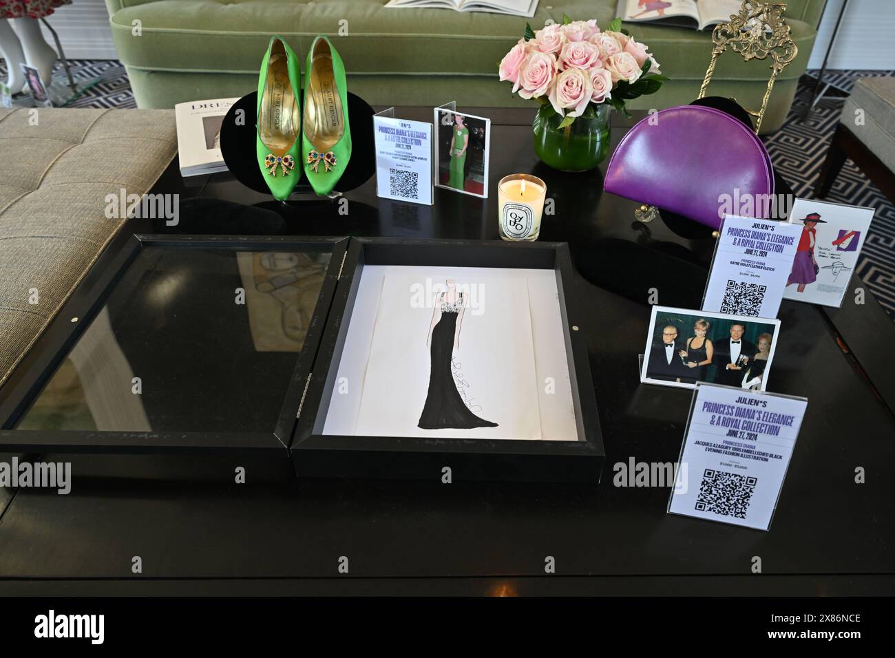 Dresses and personal items owned by Princess Diana on display during a ...