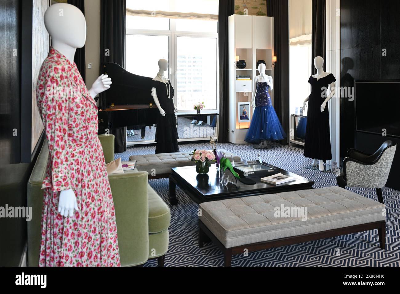 Dresses and personal items owned by Princess Diana on display during a ...