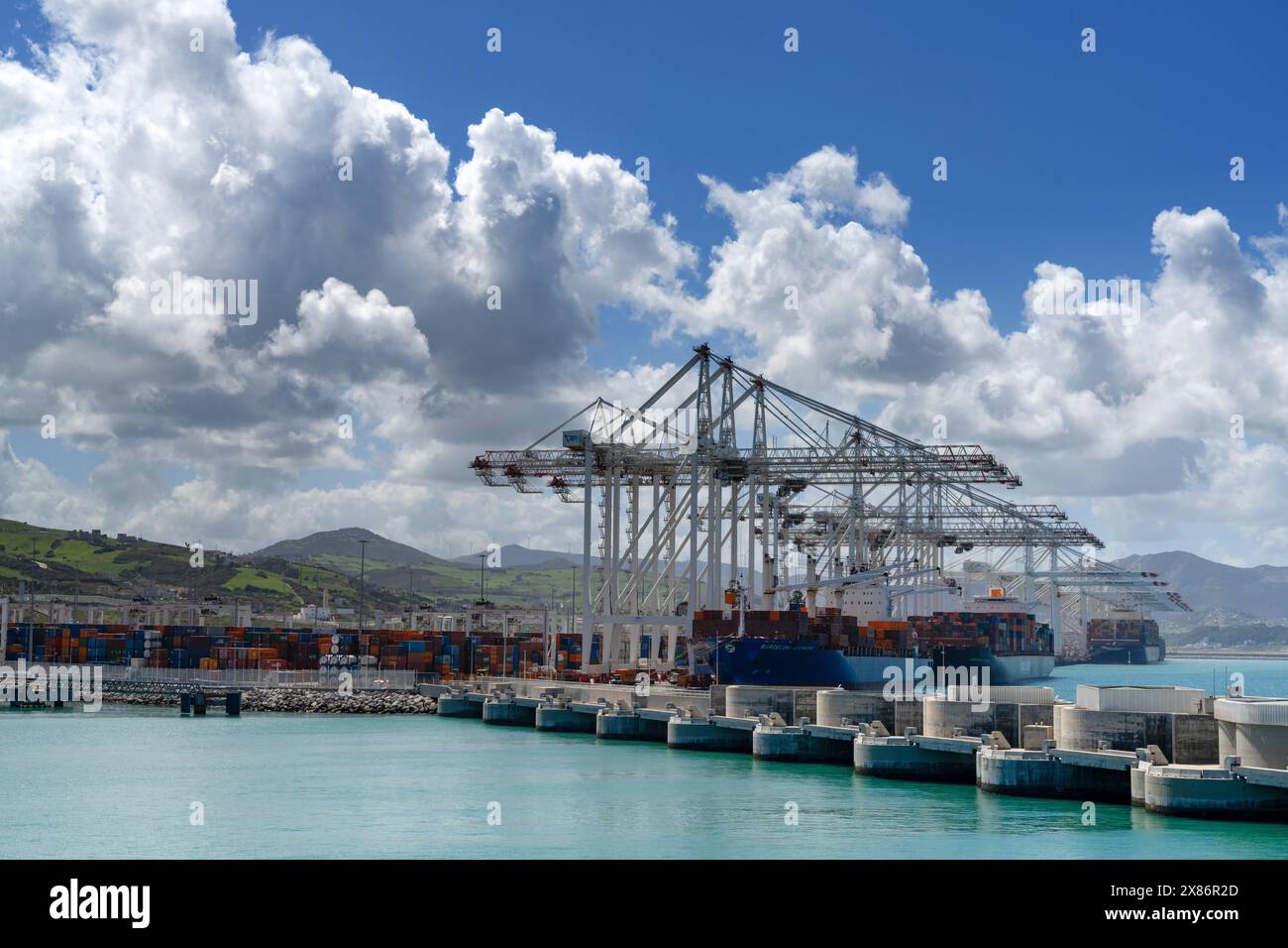 Tangier, Morocco - 1 April, 2024: container ships being unloaded and ...