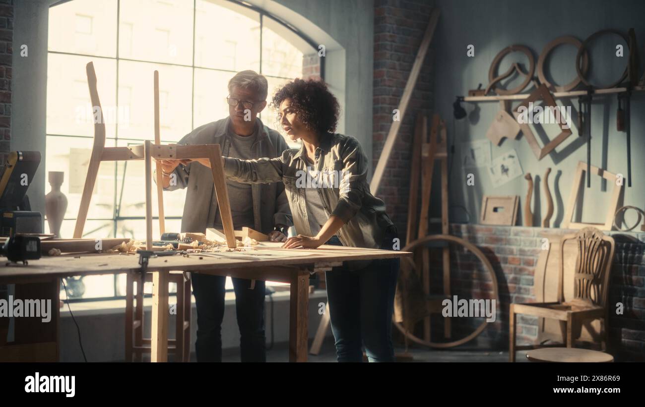 Portrait of Two Carpenters Working Together in a Woodwork Workshop ...