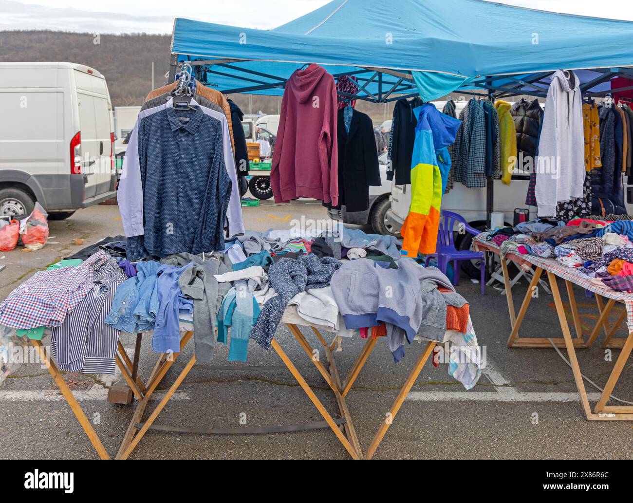 Used Clothes Second Hand Garment Stand at Flea Market Stock Photo - Alamy