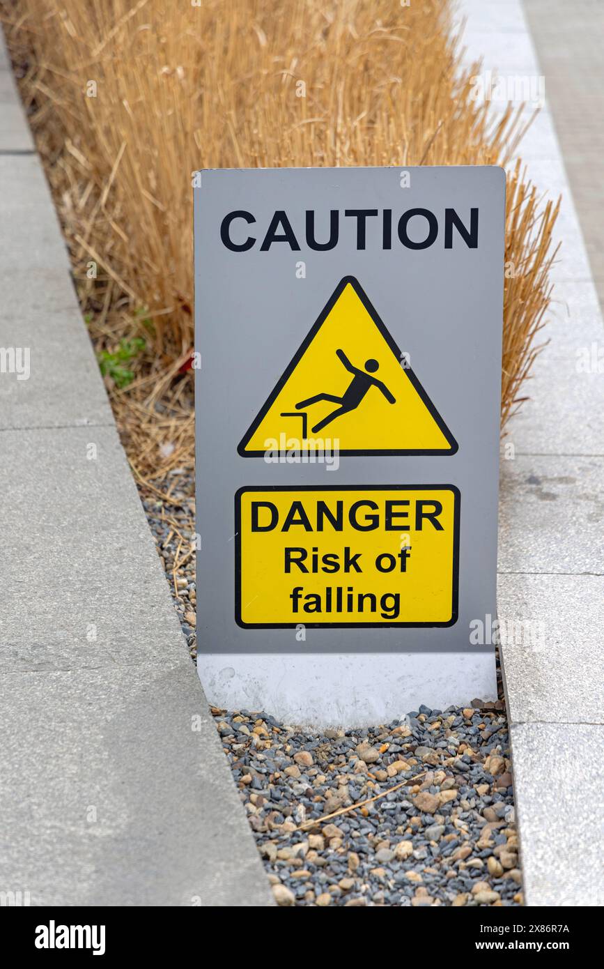 Caution Danger Sign Risk of Falling Between Pathways Warning Stock ...