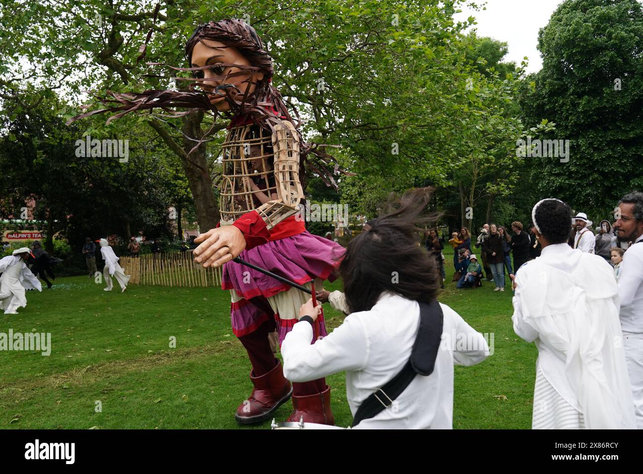 Little Amal, a 12-foot tall puppet of a ten-year-old Syrian refugee ...