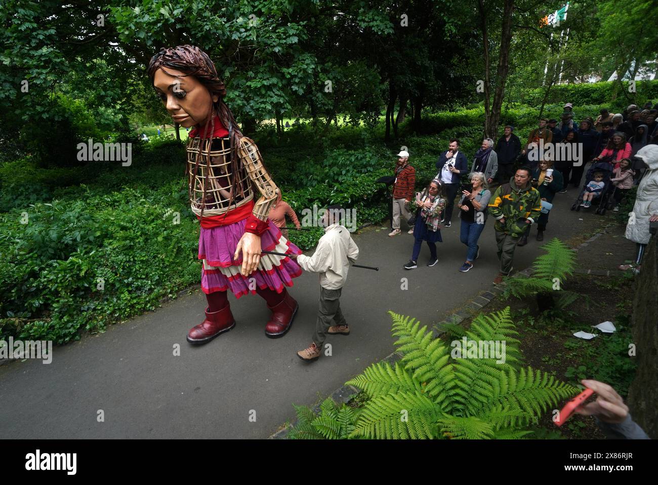 Little Amal, a 12-foot tall puppet of a ten-year-old Syrian refugee ...