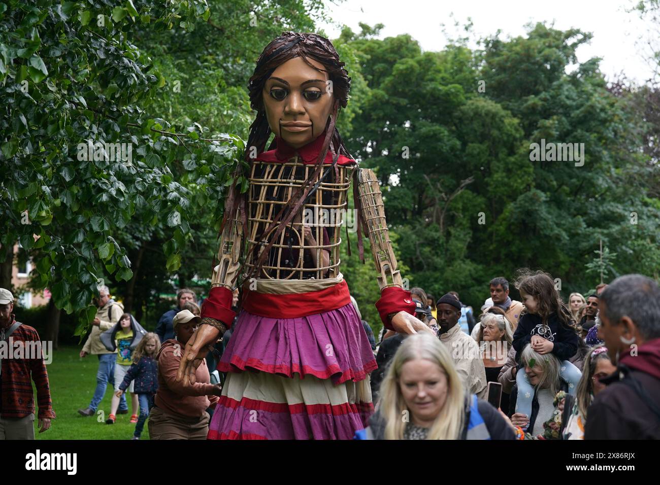 Little Amal, a 12-foot tall puppet of a ten-year-old Syrian refugee ...