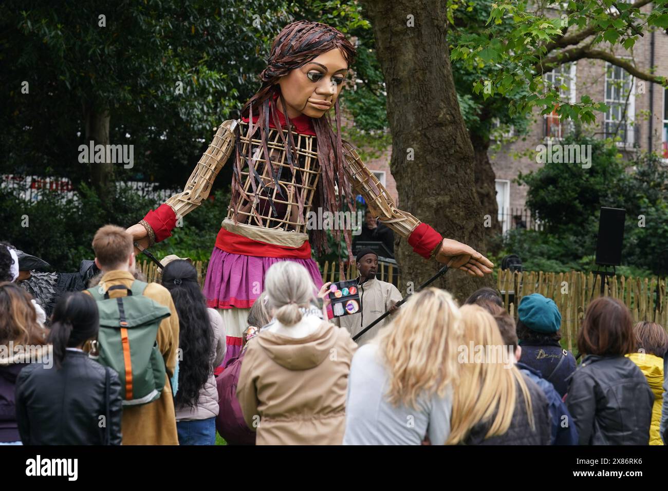 Little Amal, a 12-foot tall puppet of a ten-year-old Syrian refugee ...