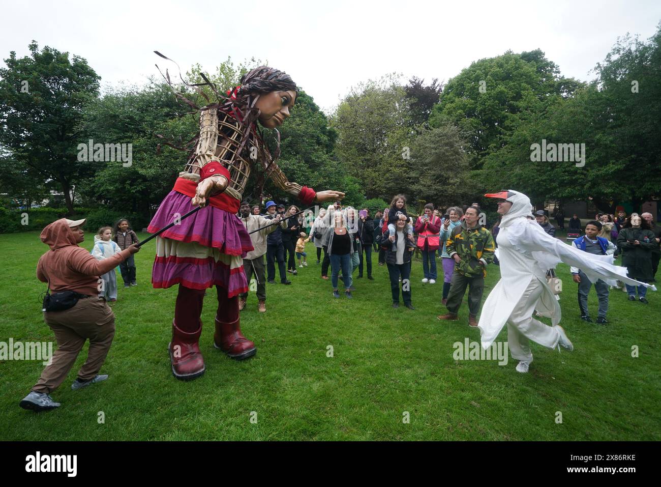 Little Amal, a 12-foot tall puppet of a ten-year-old Syrian refugee ...
