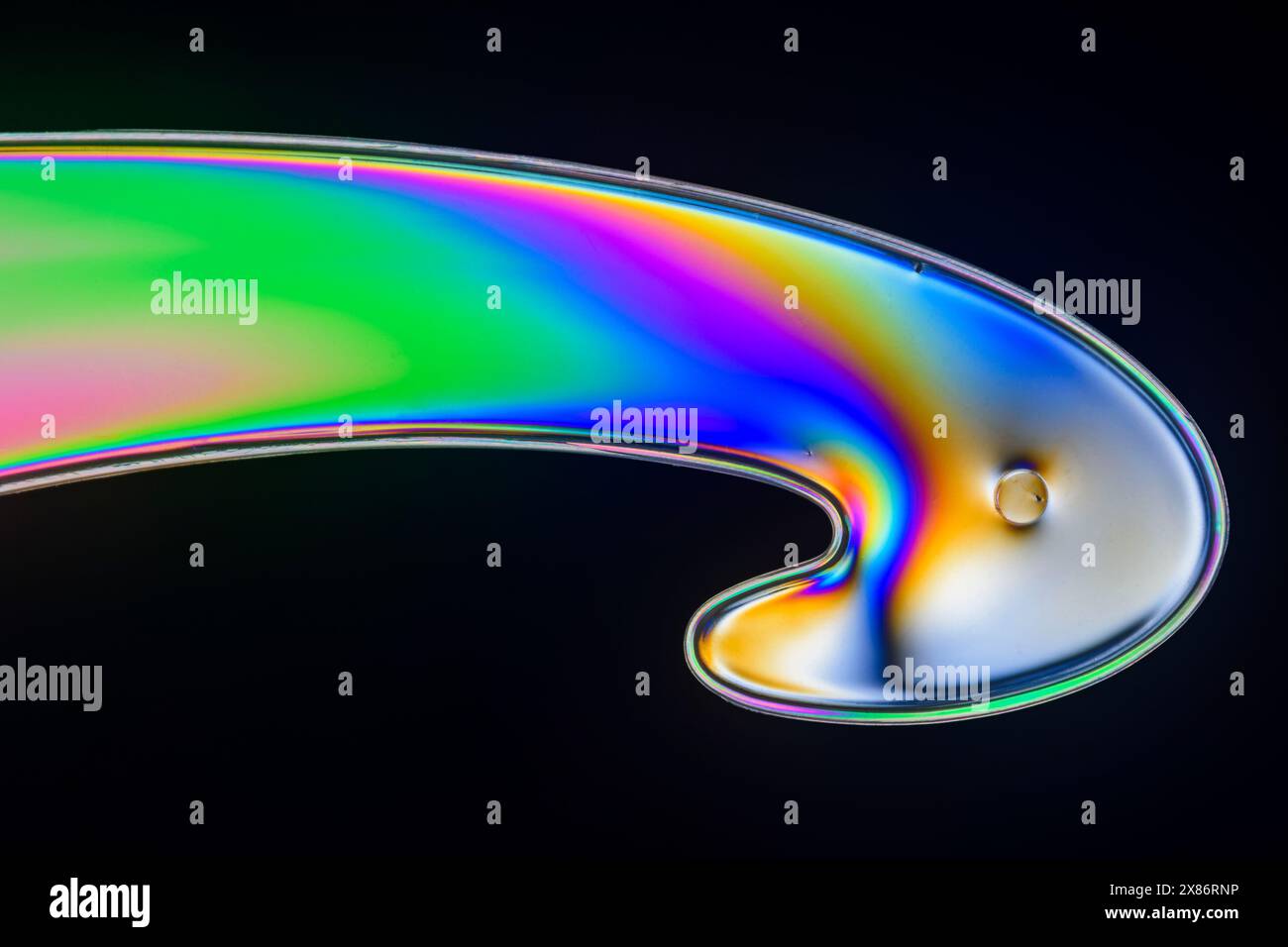 Detail from a Rotring clear plastic french curve drawing aid viewed ...