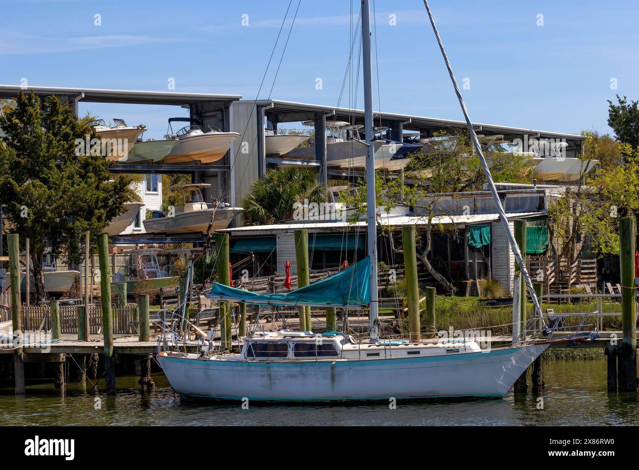 Boats seen stied to dock and dry dock, on three story ramps at Shem ...