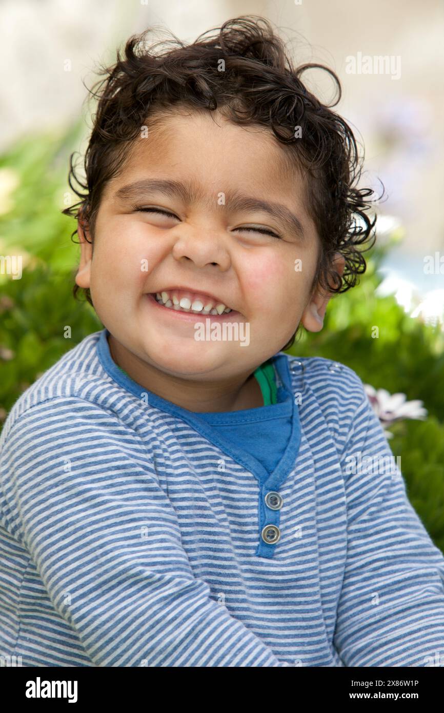portrait of a adorable hispanic little boy outdoors Stock Photo - Alamy
