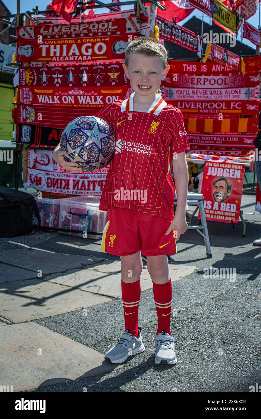LIVERPOOL, ENGLAND - MAY 19: Nine -year-old boy in the streets of ...