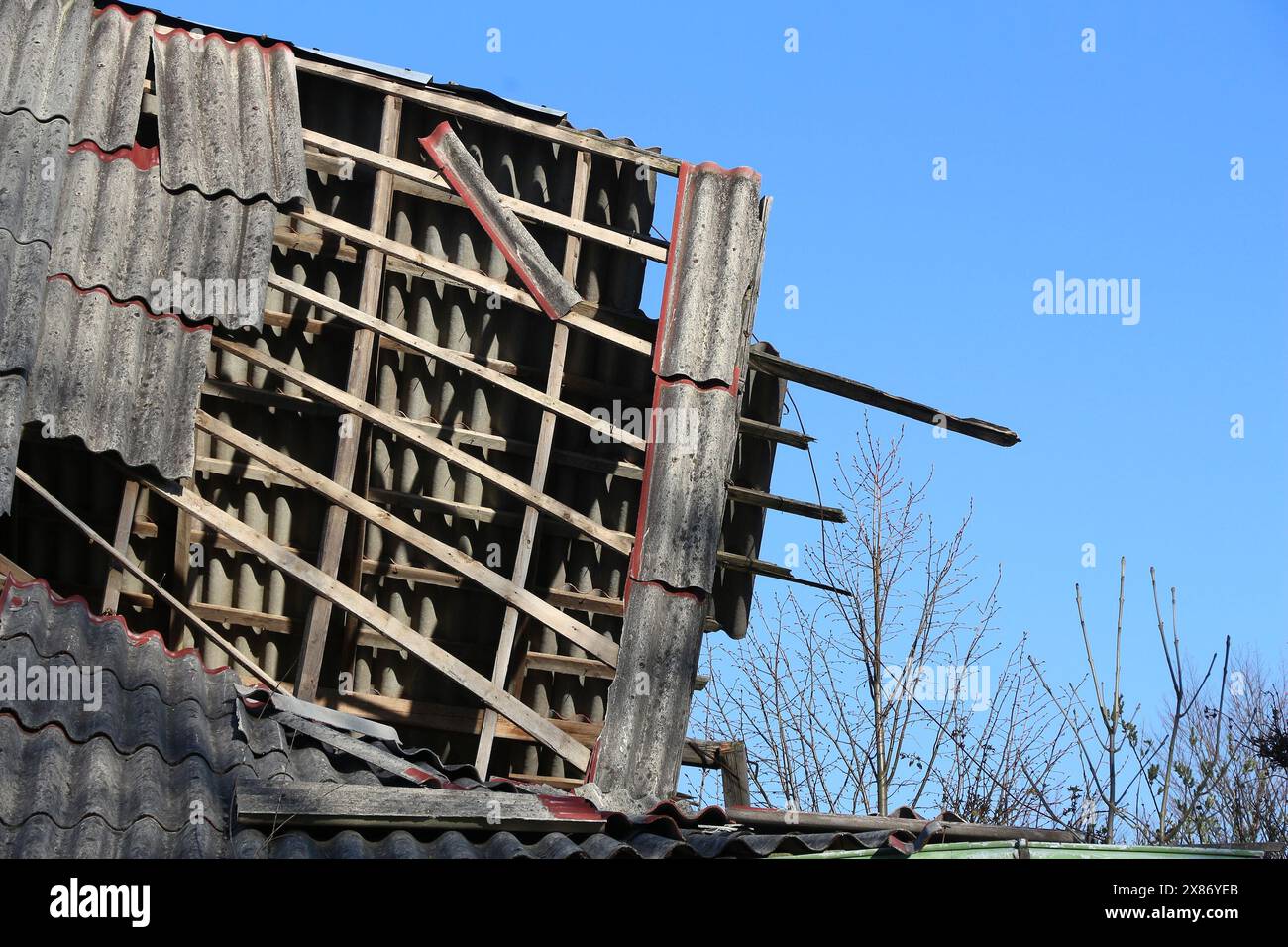 Collapsed roof in an old house in Bielsko Biala, Poland. Dangerous ruin ...