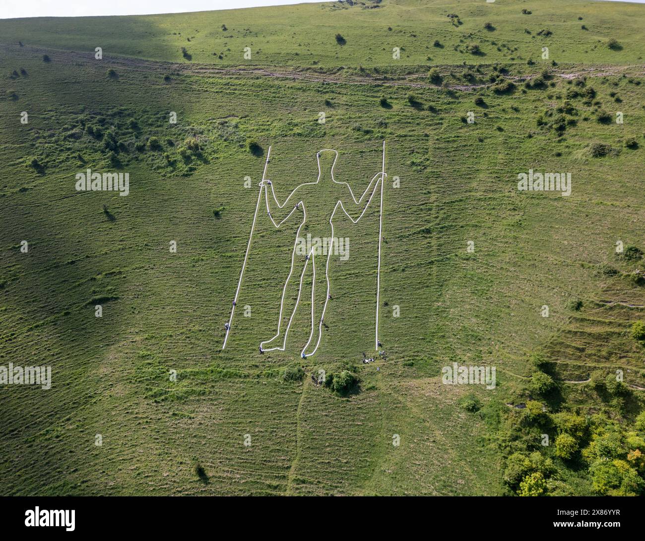 Volunteers below paint the long man of wilmington hi-res stock ...