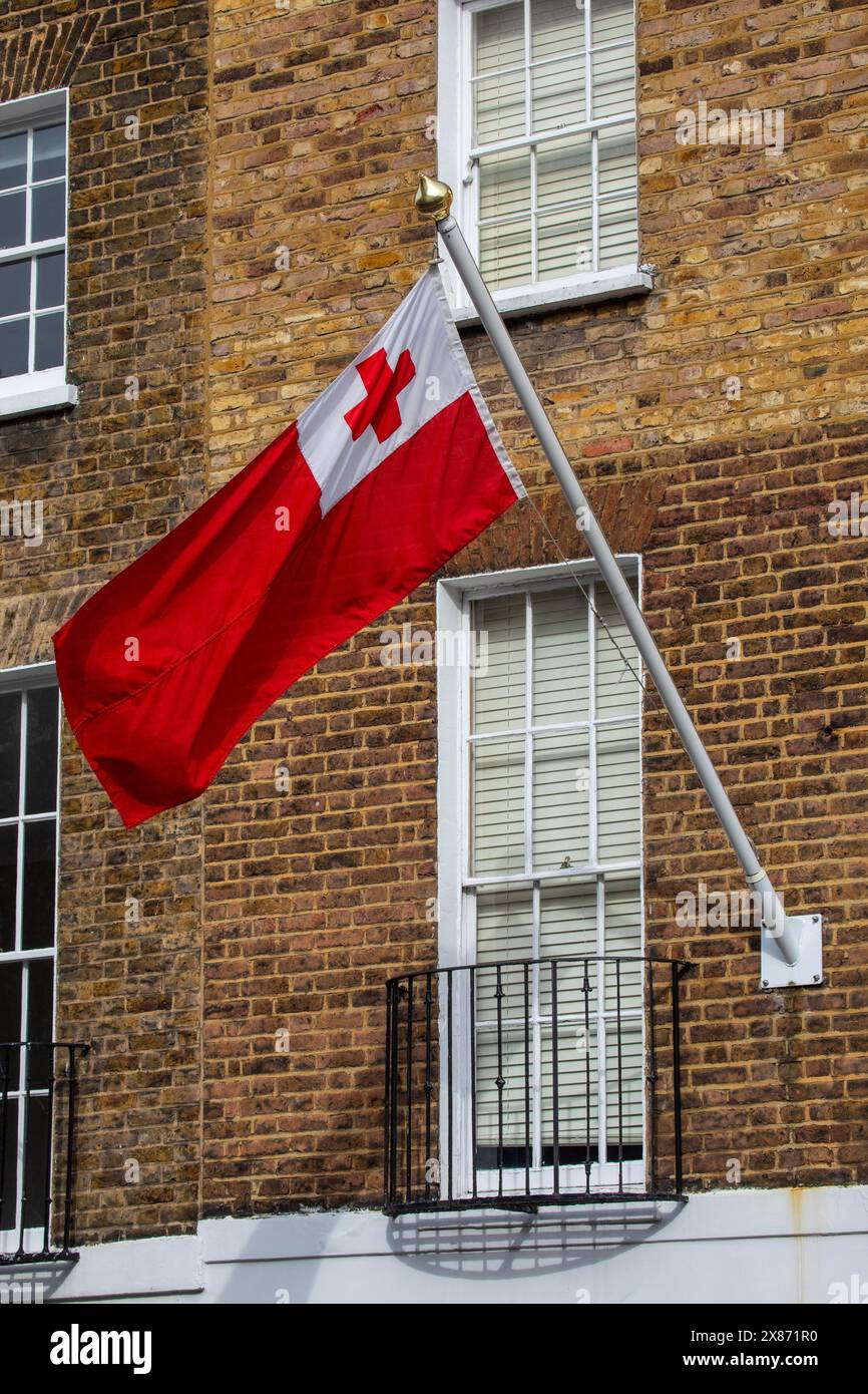 London, UK - March 4th 2024: The Tongan flag flying above the entrance ...