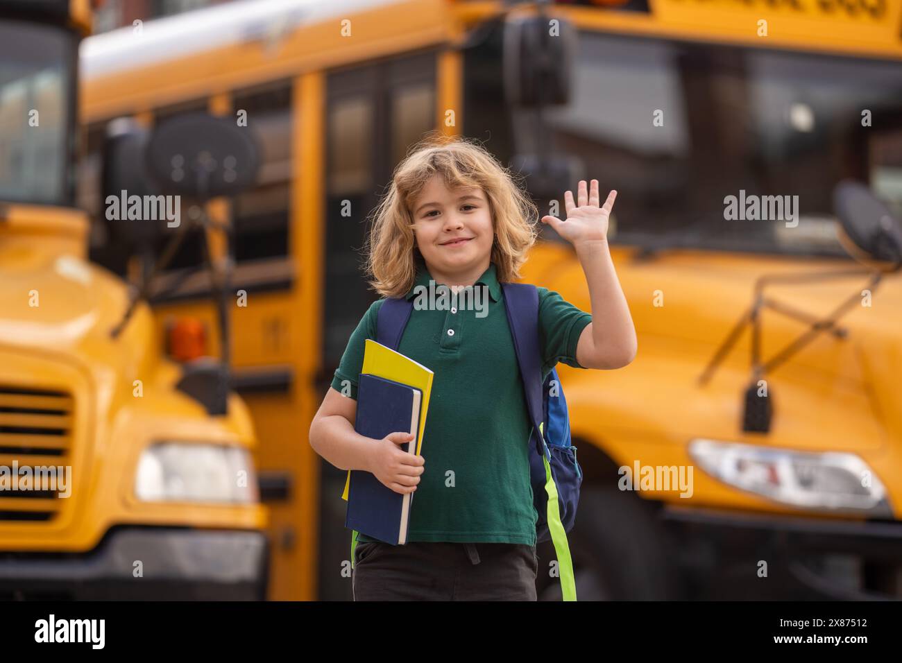 Child getting on the school bus. American School. Back to school. Bye ...
