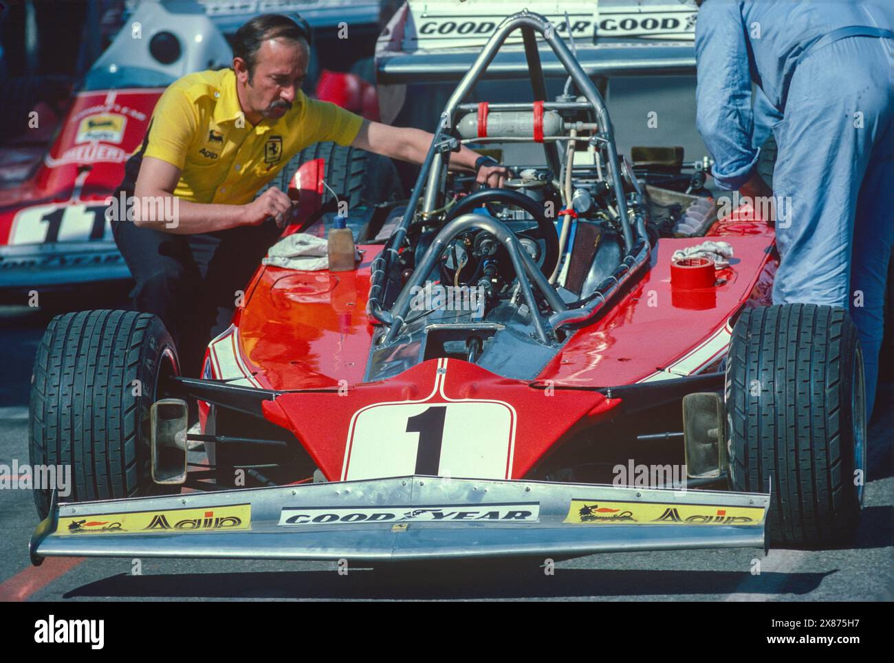 Mechanics work on Niki Lauda's 312T Ferrari for Inaugural USGP West ...