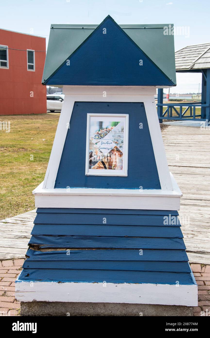 Advertising signs on a lighthouse decoration in downtown Summerside, Prince Edward Island ...