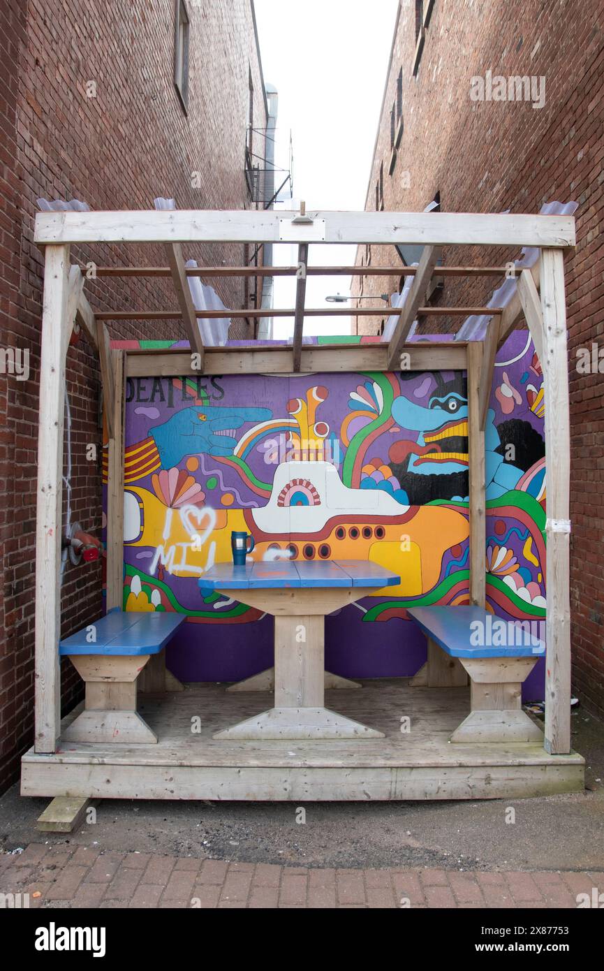 The Beatles Yellow Submarine mural at a picnic table in downtown ...