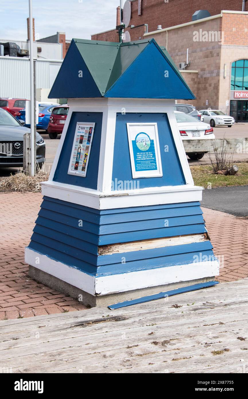 Advertising signs on a lighthouse decoration in downtown Summerside ...