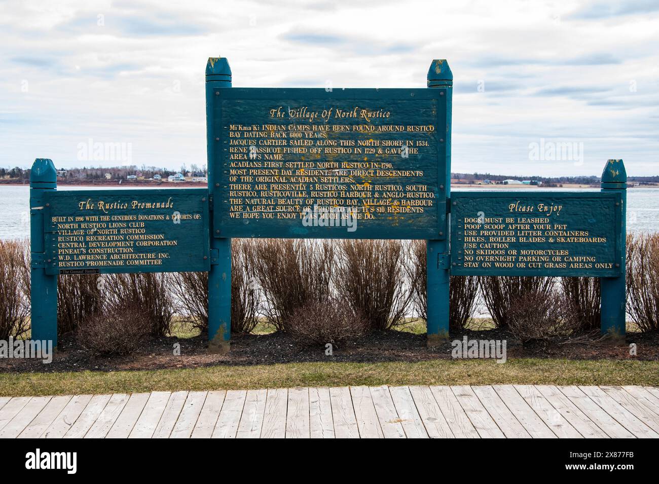 Wooden signs on the promenade in North Rustico, Prince Edward Island ...