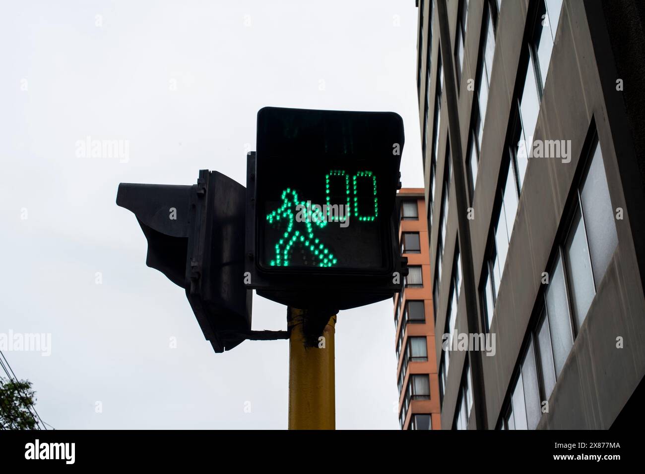 green traffic light with counter for pedestrians in Lima in Peru in ...
