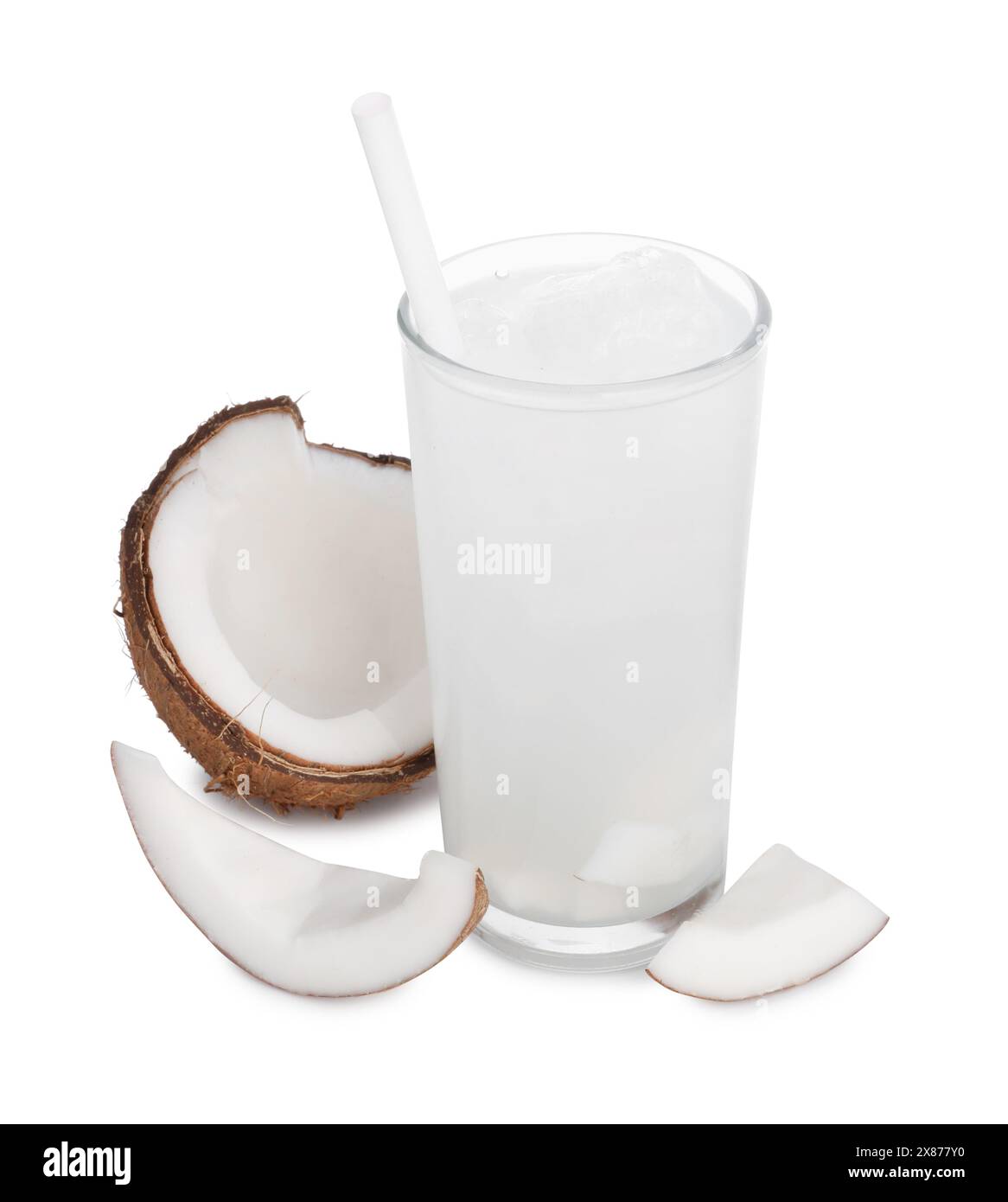 Glass of coconut water, ice cubes and nut isolated on white Stock Photo ...