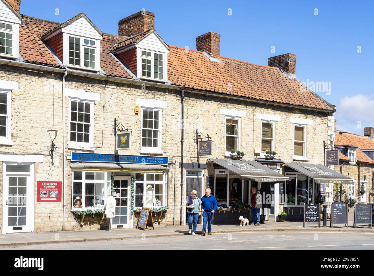 Thornton le Dale village centre- people shopping in the small local ...
