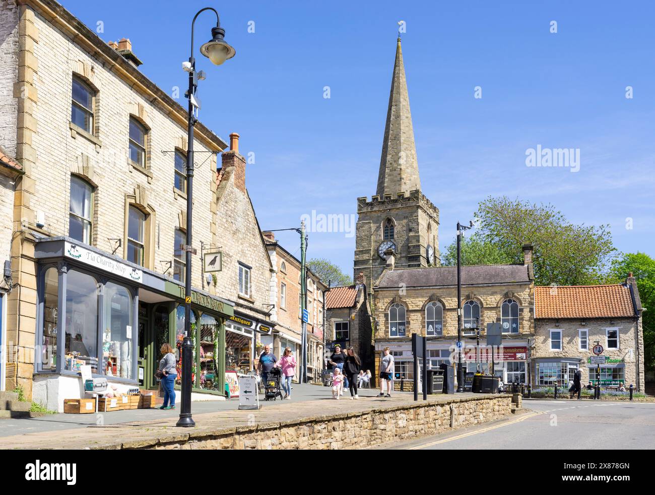 Pickering sops on the Market Place and Birdgate with the tower of St ...